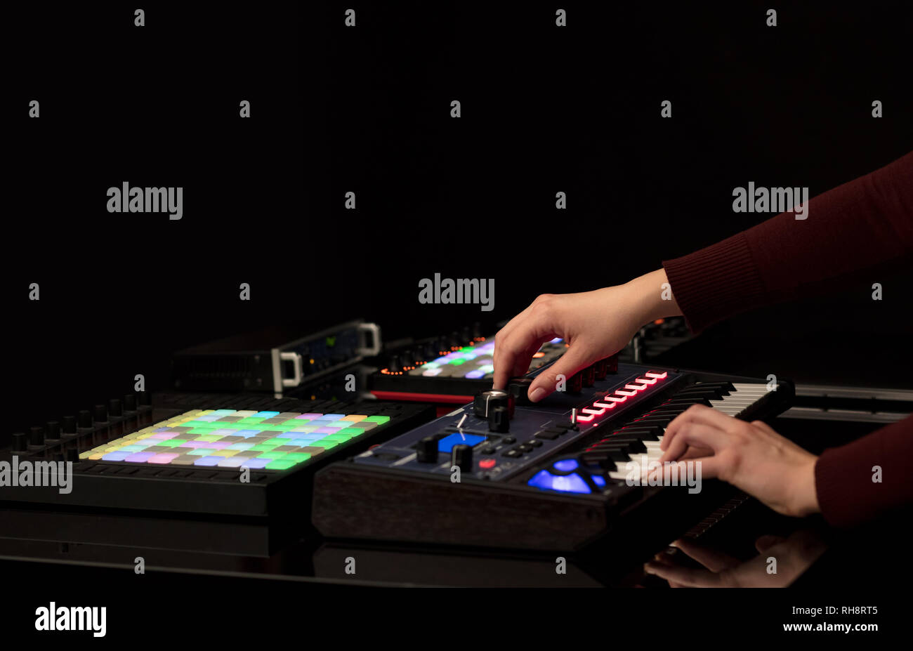 Dj hand remixing music on midi controller Stock Photo - Alamy