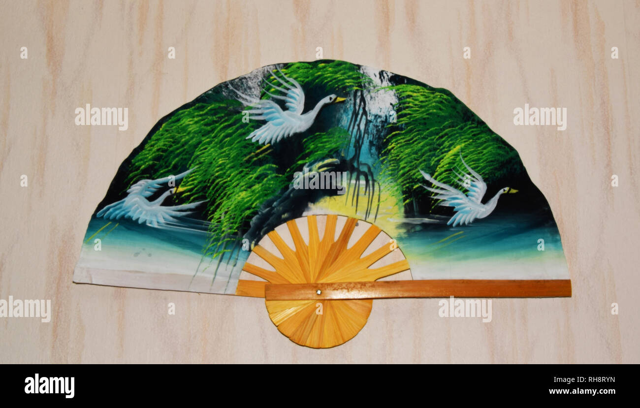 Wooden fan with traditional chinese colorfully painted Stock Photo - Alamy