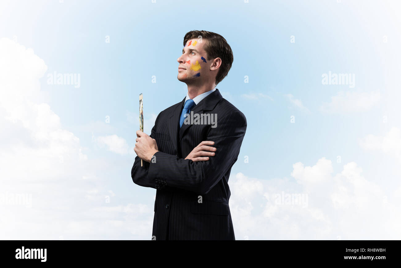 Inspiration of young creative businessman Stock Photo - Alamy