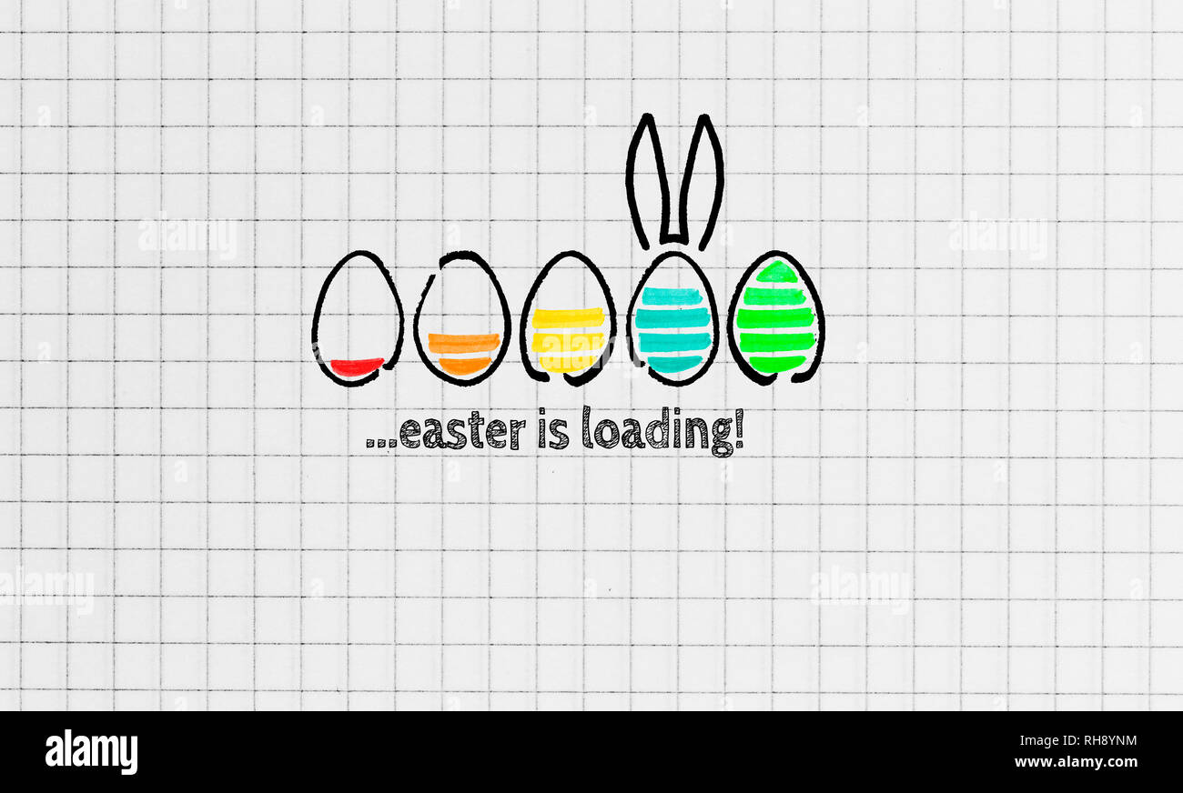 Easter is loading on notepad concept Stock Photo - Alamy