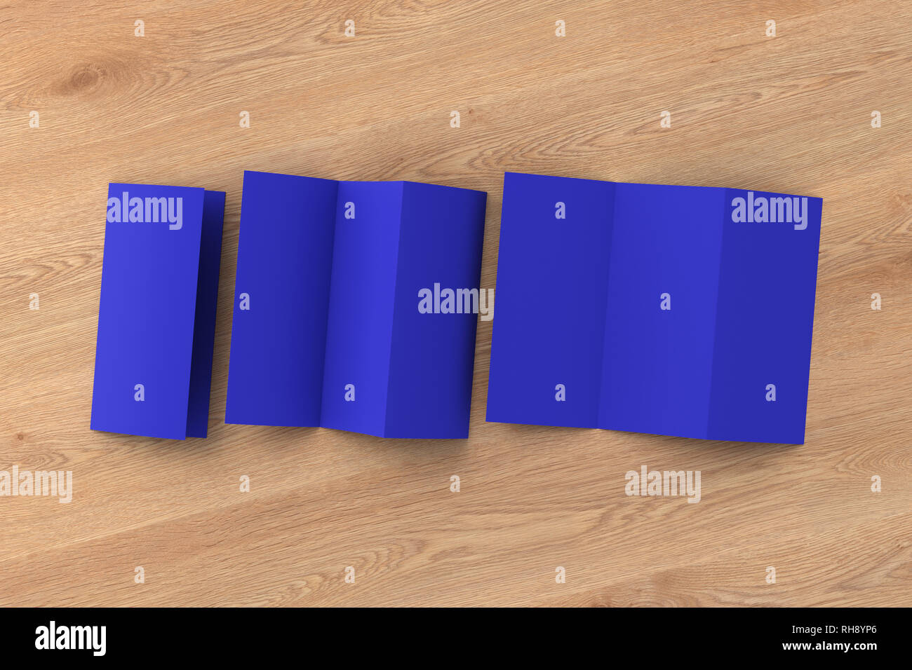 Blank blue trifold paper leaflet on wooden background. Six pages, three ...