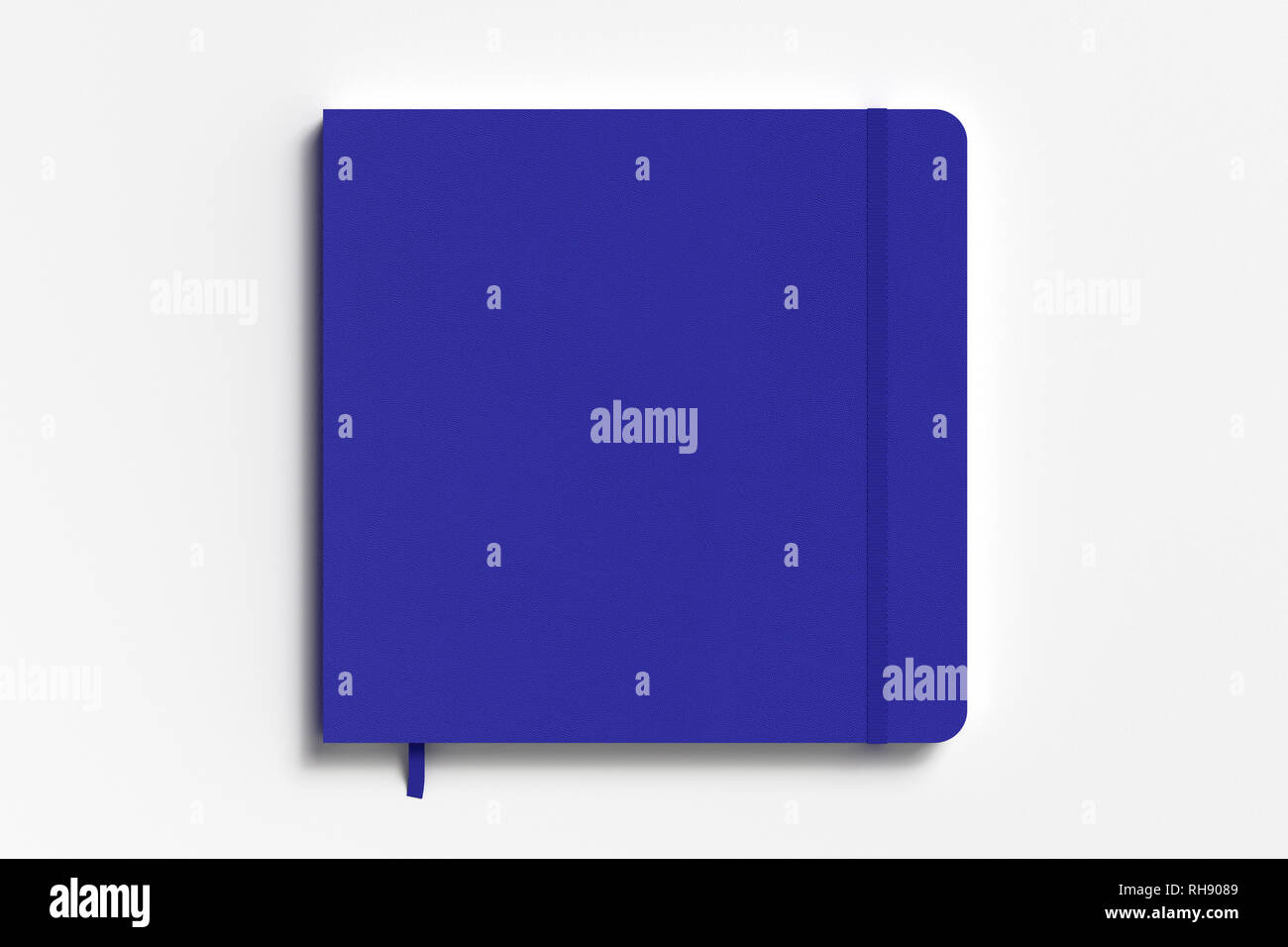 Blue square notebook with elastic band on white background Stock Photo ...