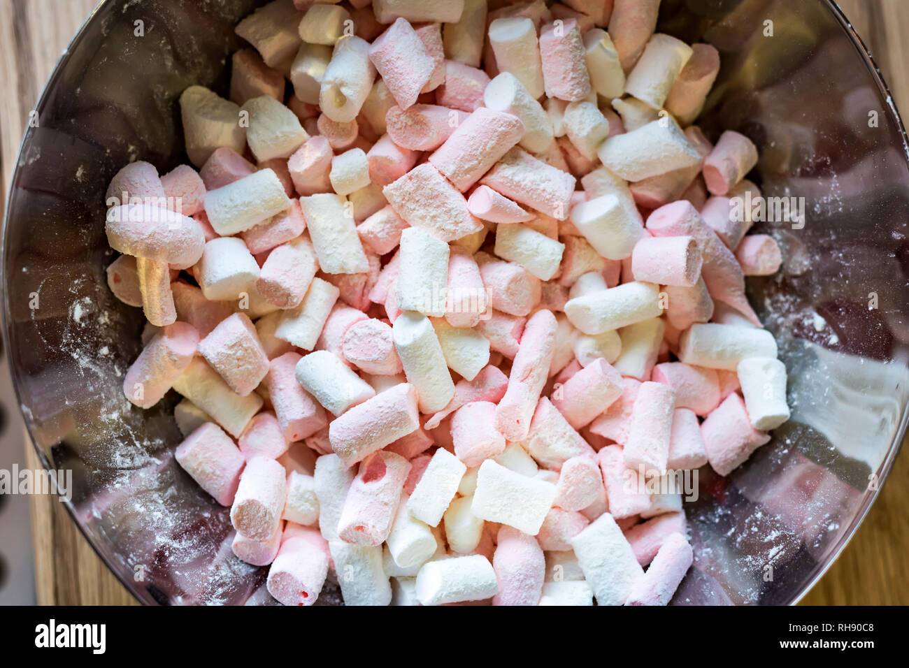 Close up of colorful mini marshmallows in bowl Stock Photo - Alamy