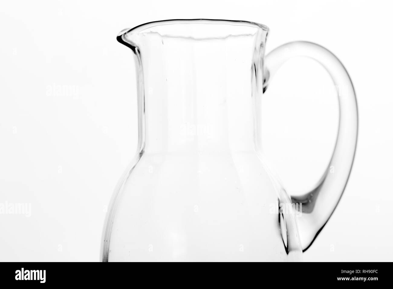 Small transparent glass jar isolated on white background Stock Photo ...