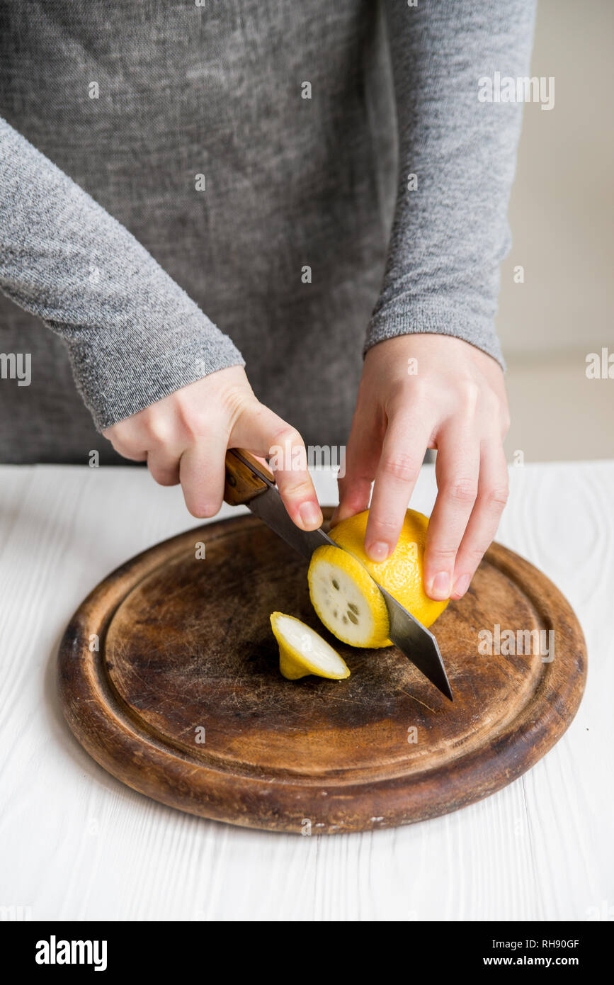 Hand cutting ponytail hi-res stock photography and images - Alamy