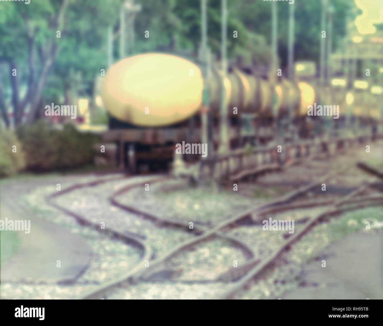 Blur of cargo train carry the fuel on the railway track. Vintage style ...