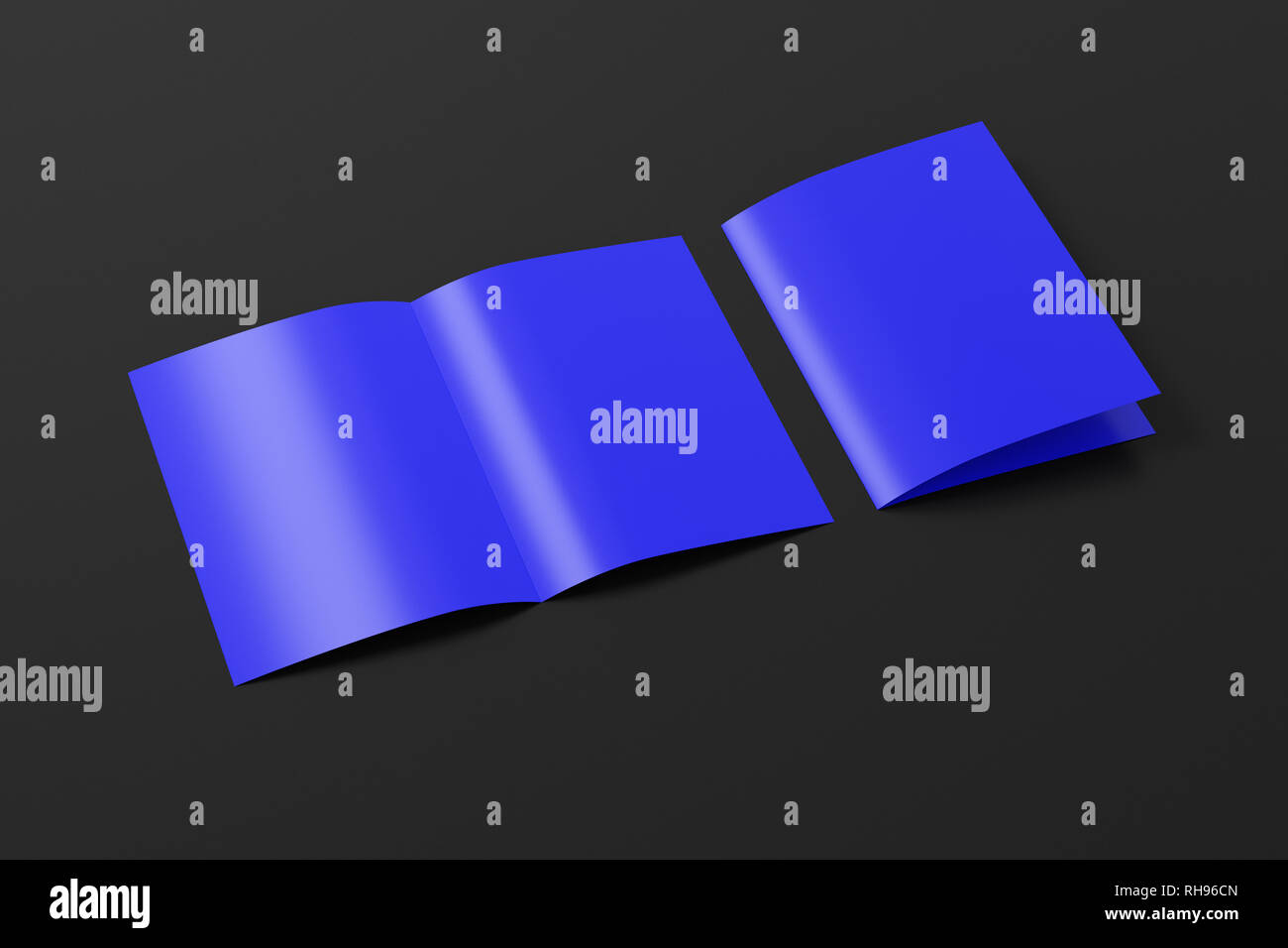 Blank blue open and folded half-folded flyer leaflet on black ...