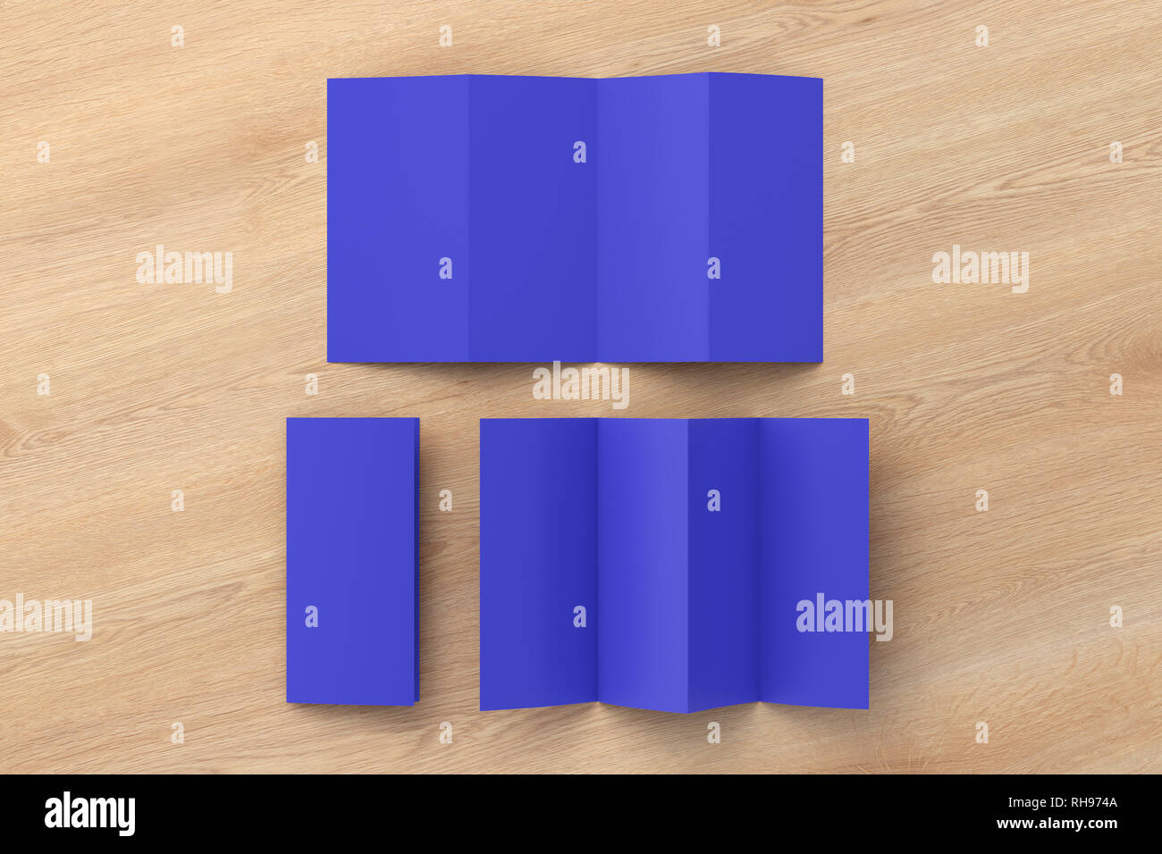 Blank blue folded paper leaflet on wooden background. Eight pages, four ...
