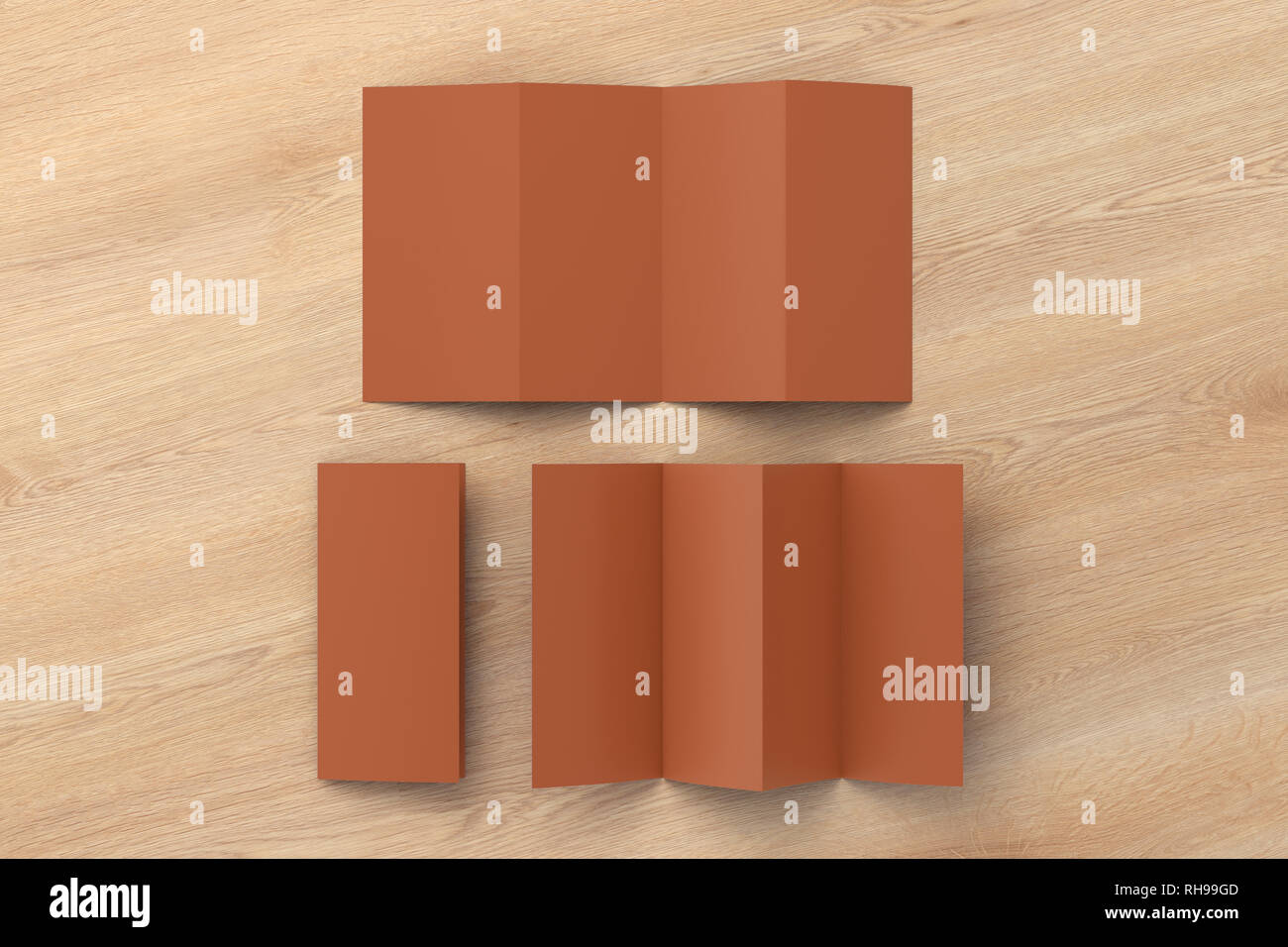 Blank brown folded paper leaflet on wooden background. Eight pages ...