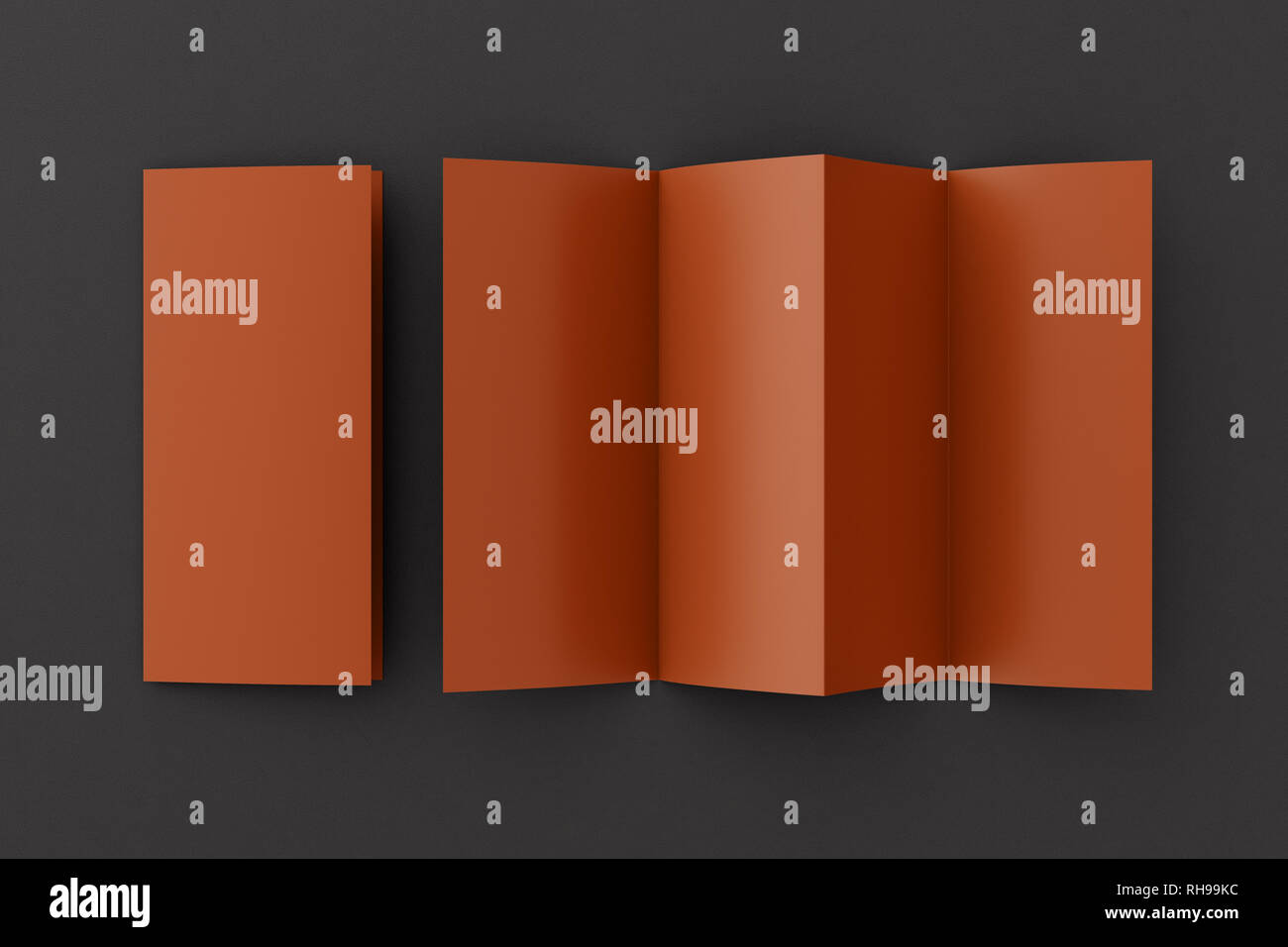 Blank brown folded paper leaflet on black background. Eight pages, four ...