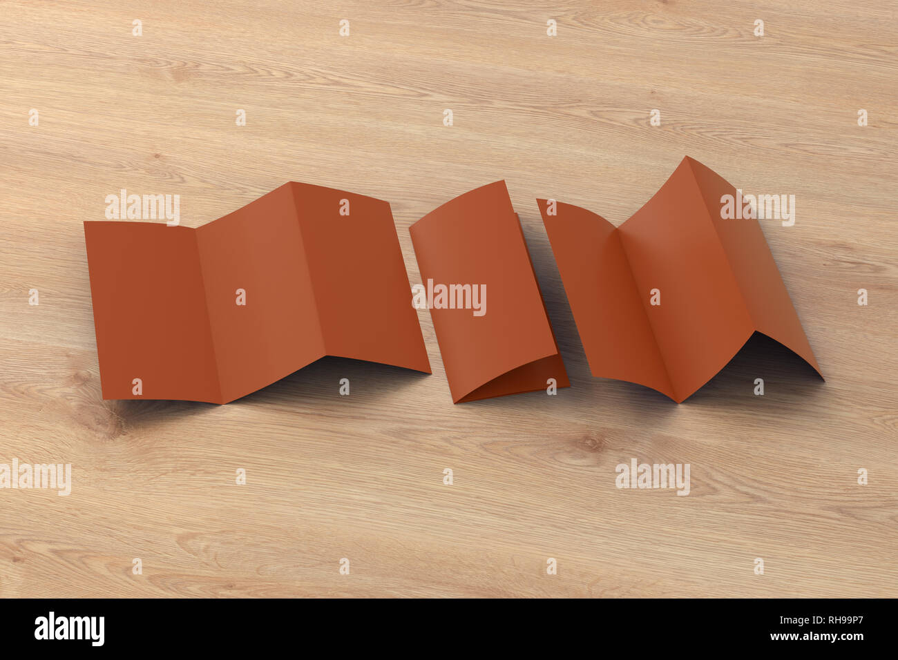 Blank brown trifold paper leaflet on wooden background. Six pages ...