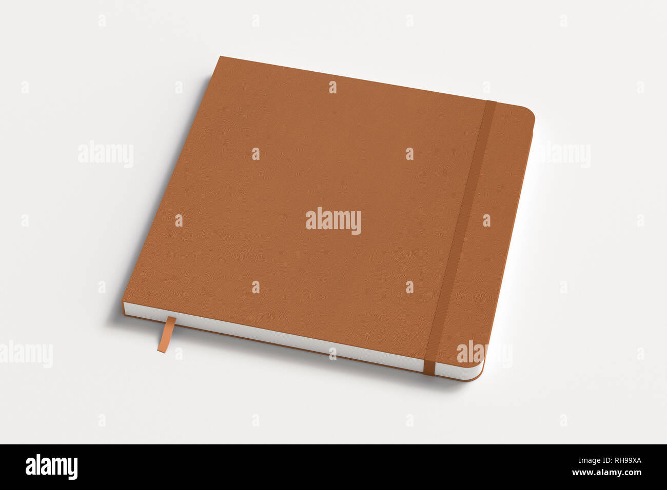Brown square notebook with elastic band on white background Stock Photo ...