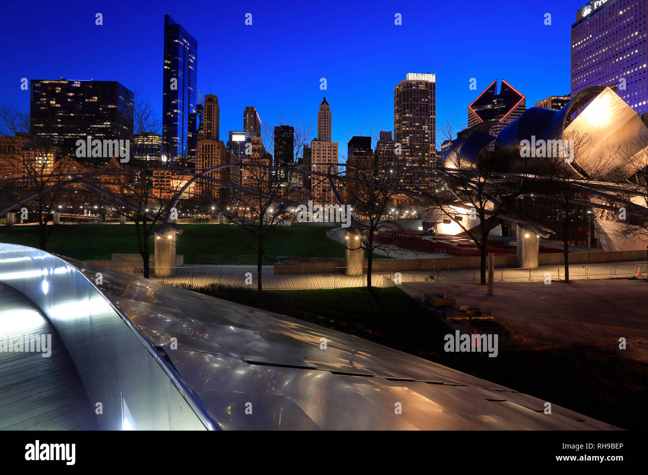 Night view of Downtown Chicago skyline with BP Pedestrian Bridge the ...