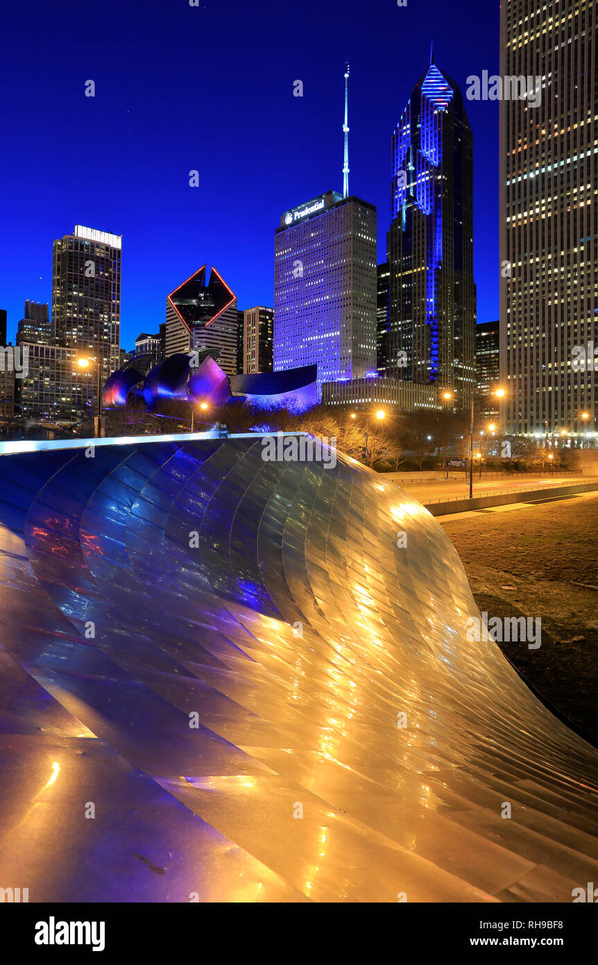 Night view of Downtown Chicago skyline with BP Pedestrian Bridge the ...