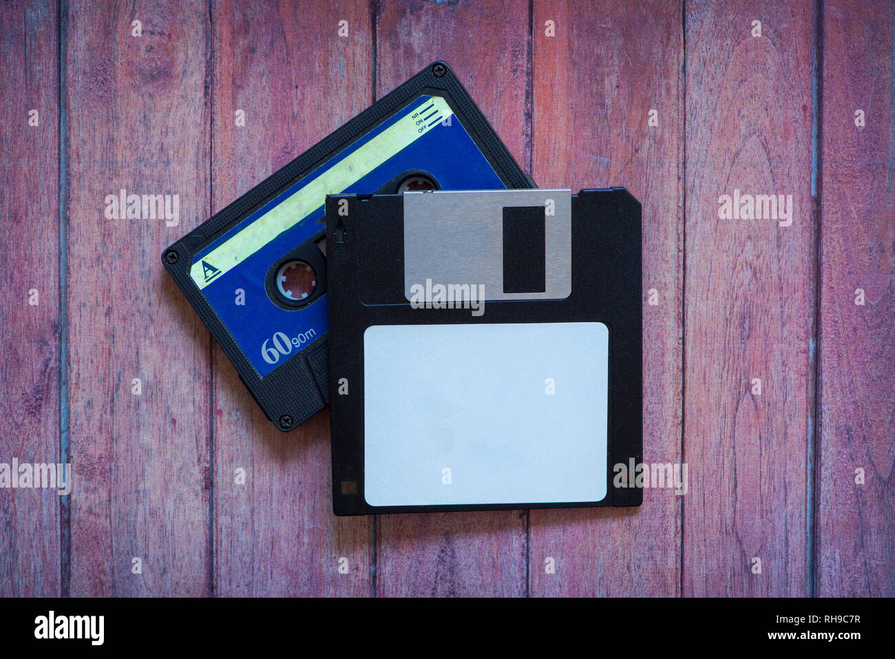 Antique pc diskettes and cassettes on a brown wooden background Stock ...