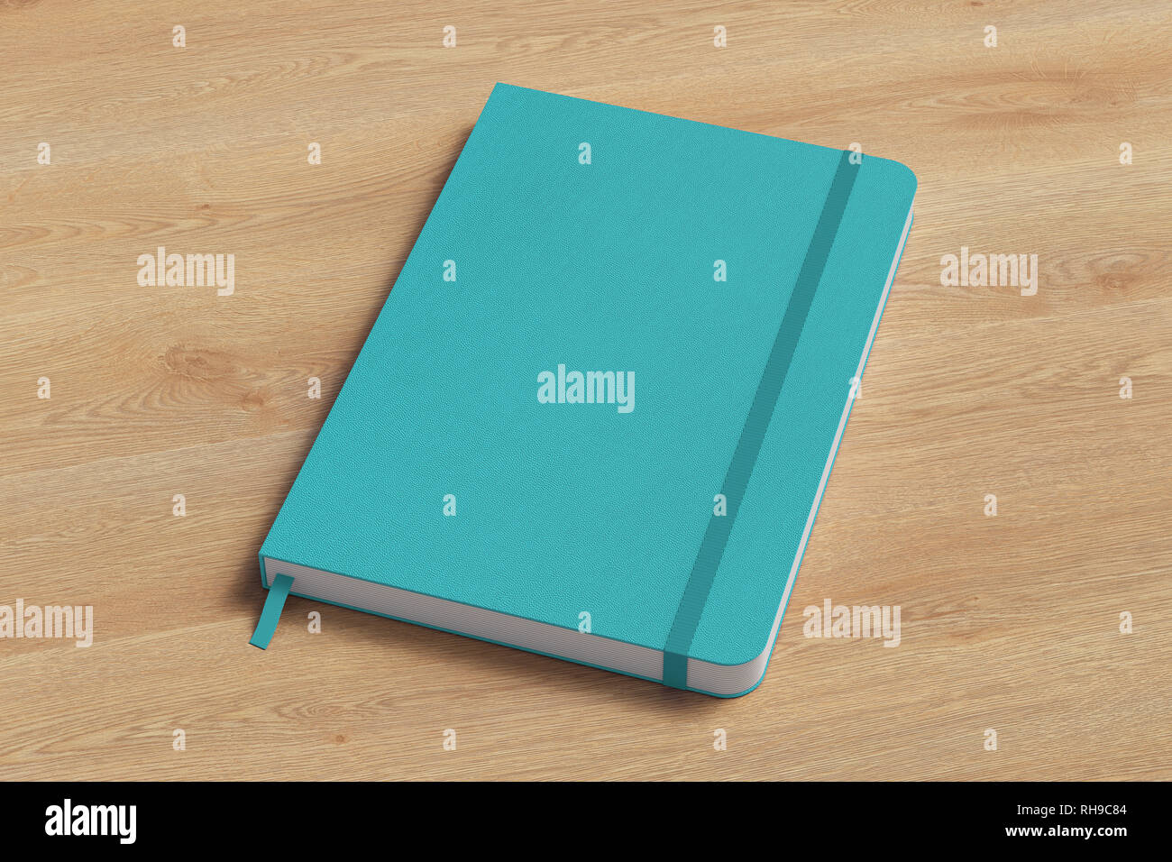 Cyan vertical notebook with elastic band on wooden background Stock ...