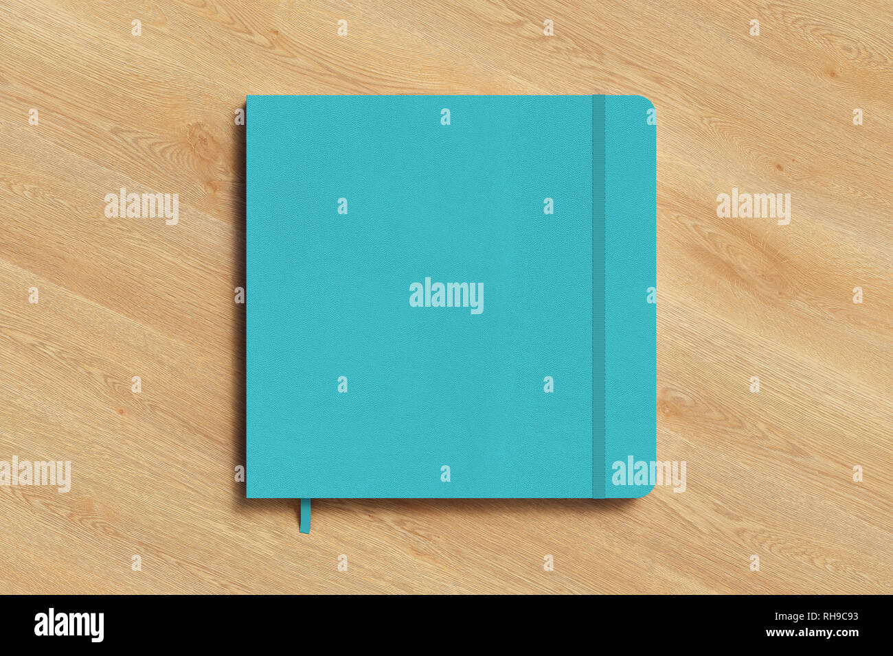 Cyan square notebook with elastic band on wooden background Stock Photo ...