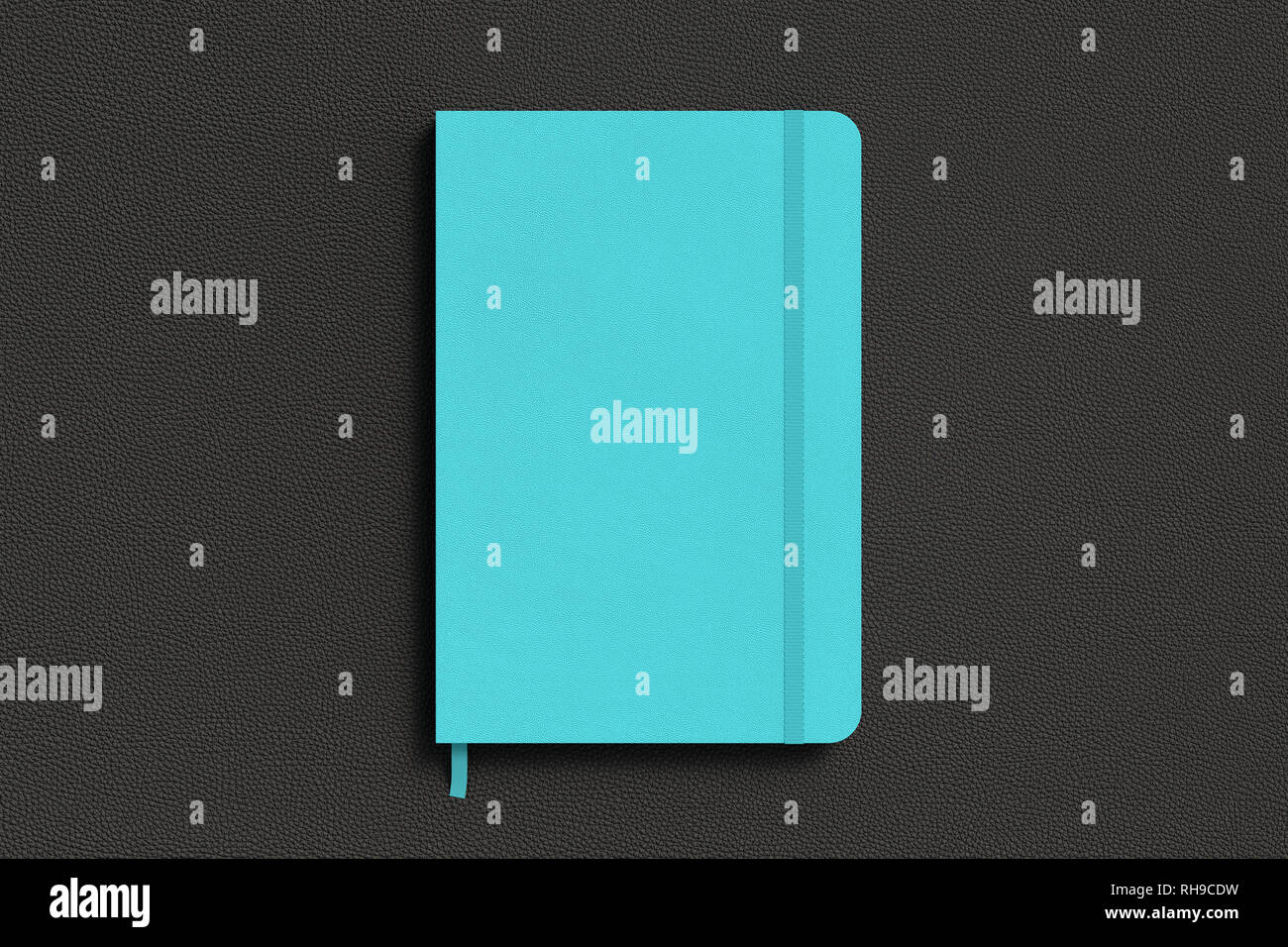 Cyan vertical notebook with elastic band on black background Stock ...