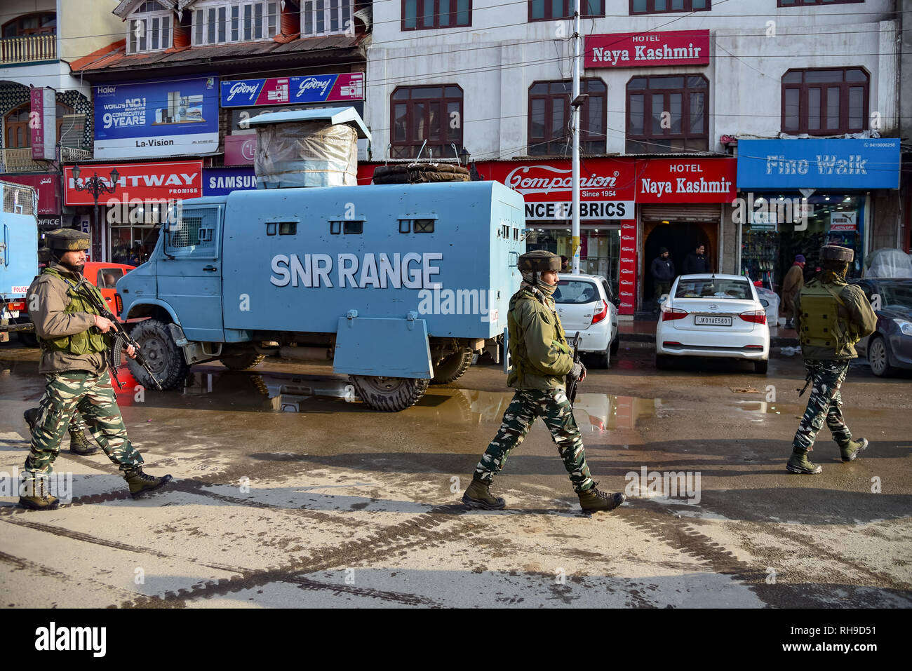 Indian paramilitary troopers seen patrolling during a random search ...