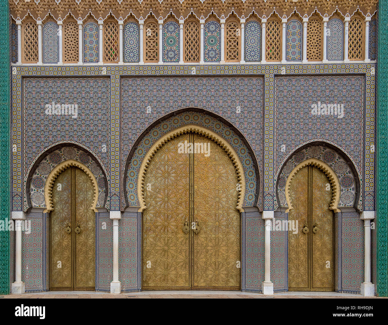 Beautiful details of Bab Majzen door of ornate golden metal on the ...