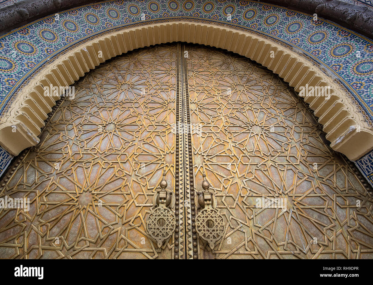 Beautiful details of Bab Majzen door of ornate golden metal on the ...