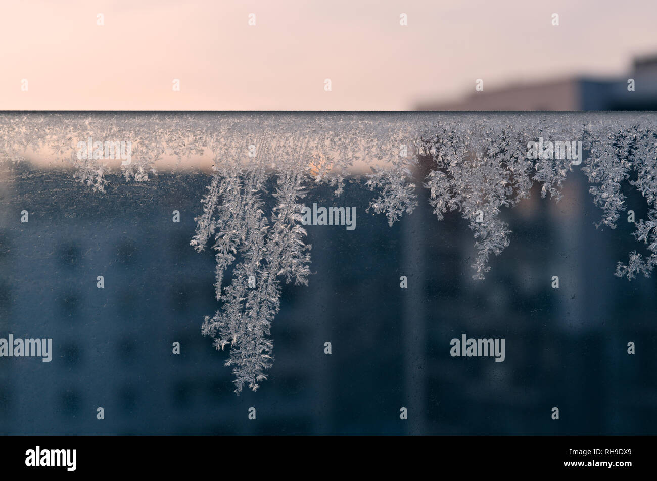 Frozen pattern on balcony glass Stock Photo - Alamy