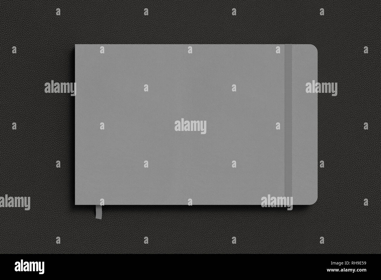 Gray horizontal notebook with elastic band on black background Stock ...