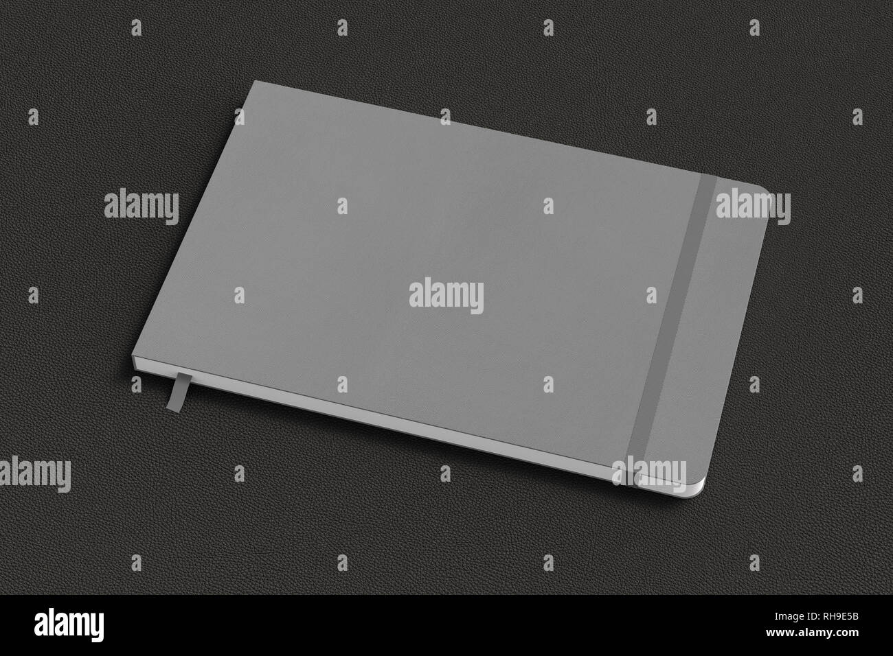 Gray horizontal notebook with elastic band on black background Stock ...