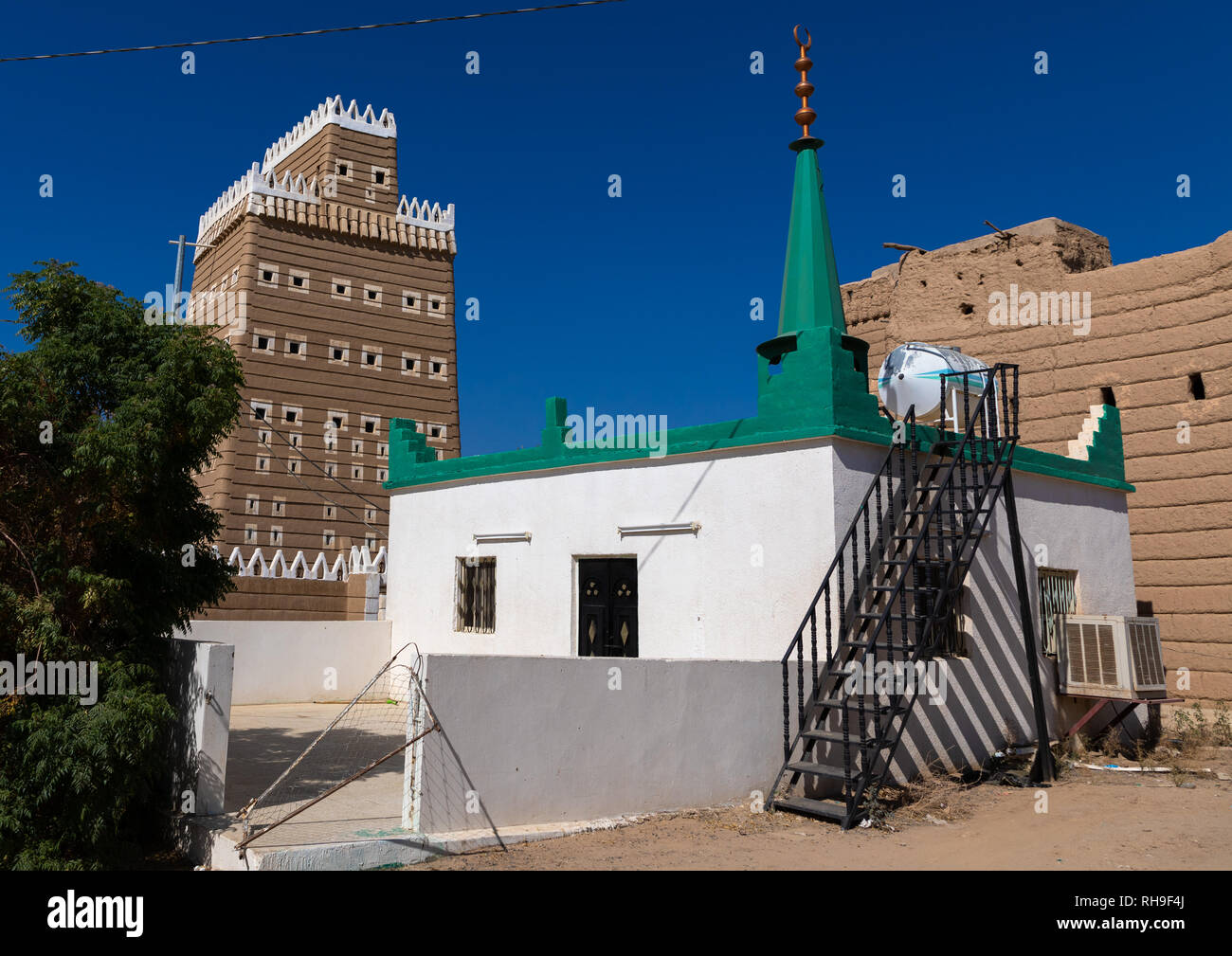 Mosque in front of a traditional old mud house, Najran Province, Najran ...