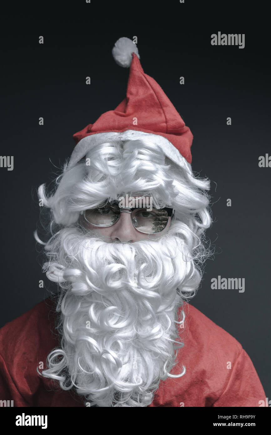 yung santa claus with reflectionn in the eyeglasses Stock Photo - Alamy