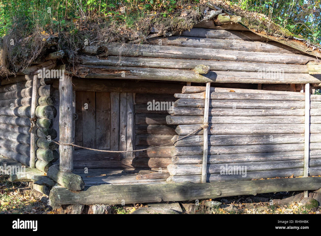 Old wooden log-crib dwelling of the ancient tribe of Latgallians in a ...