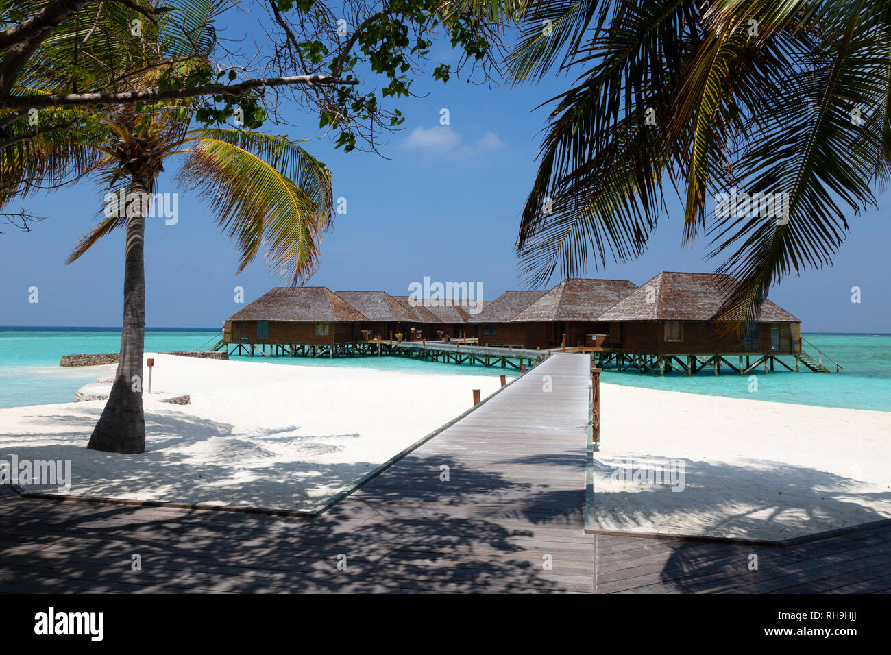 Maldives holiday resort; overwater villas, Velingandu island, Rasdhoo ...