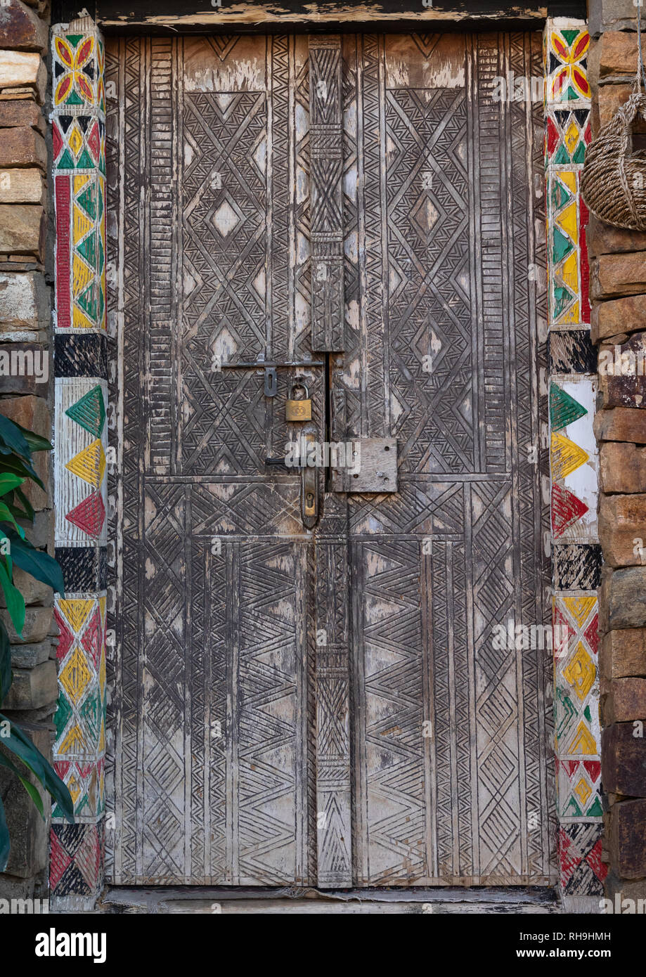 Colorful wooden door of an old asiri house, Asir province, Khamis ...