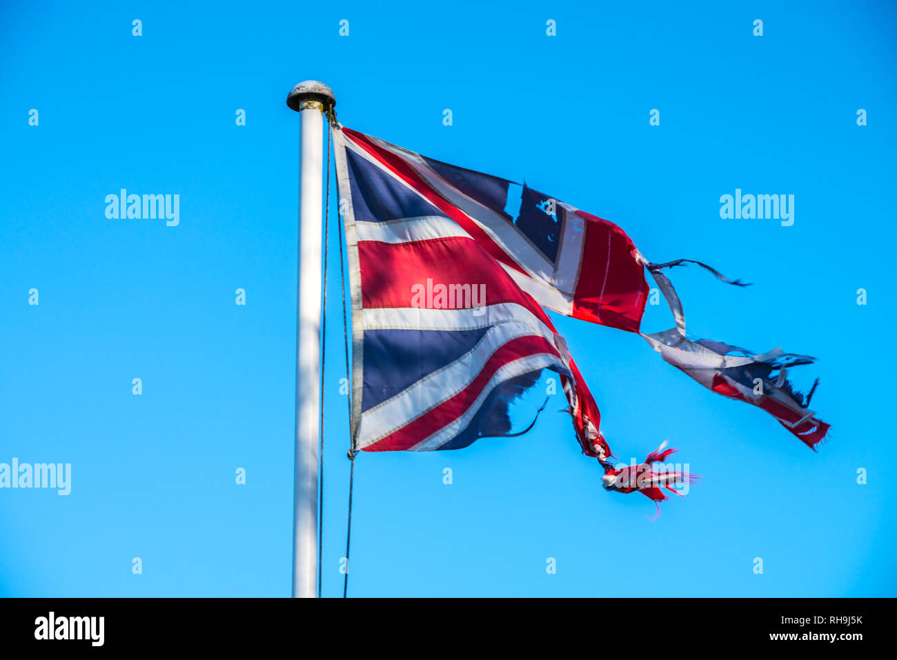 Wind damaged union flag uk hi-res stock photography and images - Alamy