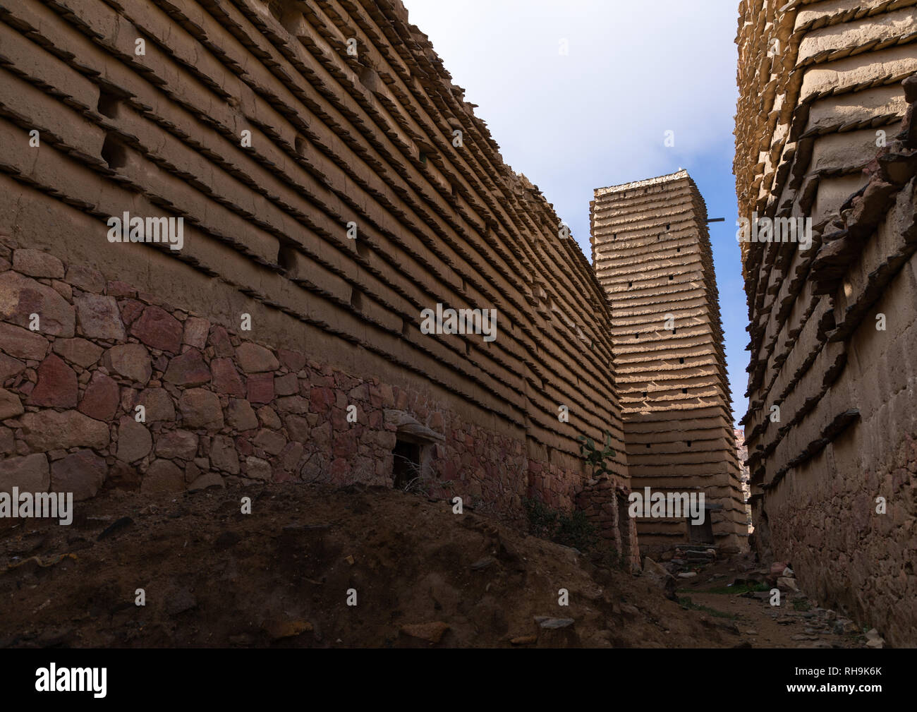 Stone and mud houses and watchtower with slates in al Khalaf village ...