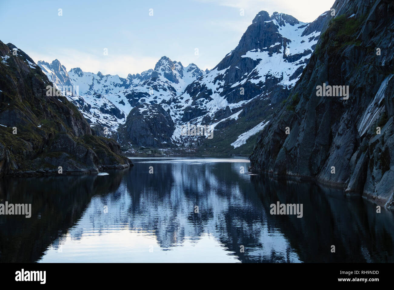 Mountains reflected in narrow Trollfjord or Trollfjorden fjord ...