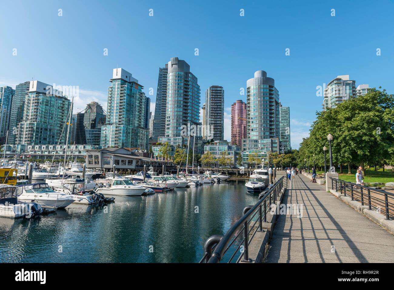 High-rise buildings on the promenade with marina, Coal Harbour ...
