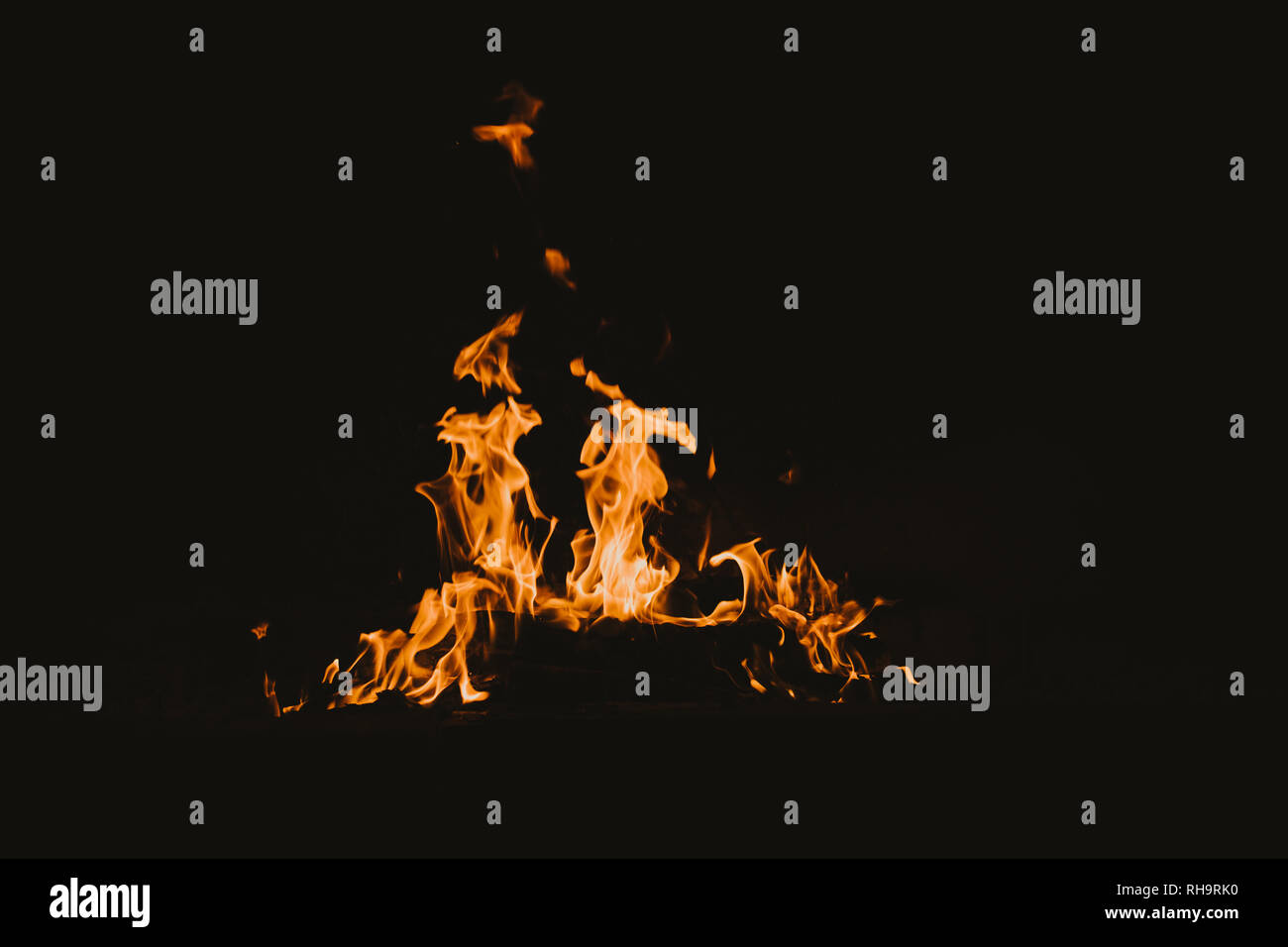 Fire flames burning isolated on black background. High resolution wood ...