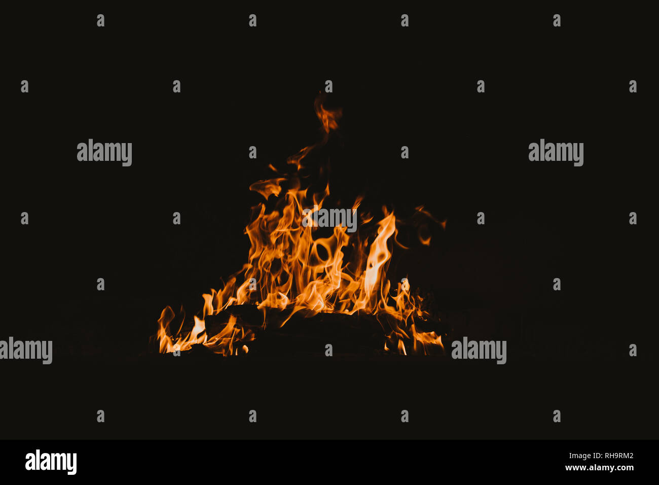 Fire flames burning isolated on black background. High resolution wood ...