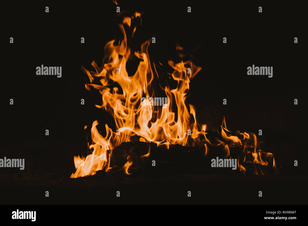 Fire flames burning isolated on black background. High resolution wood ...