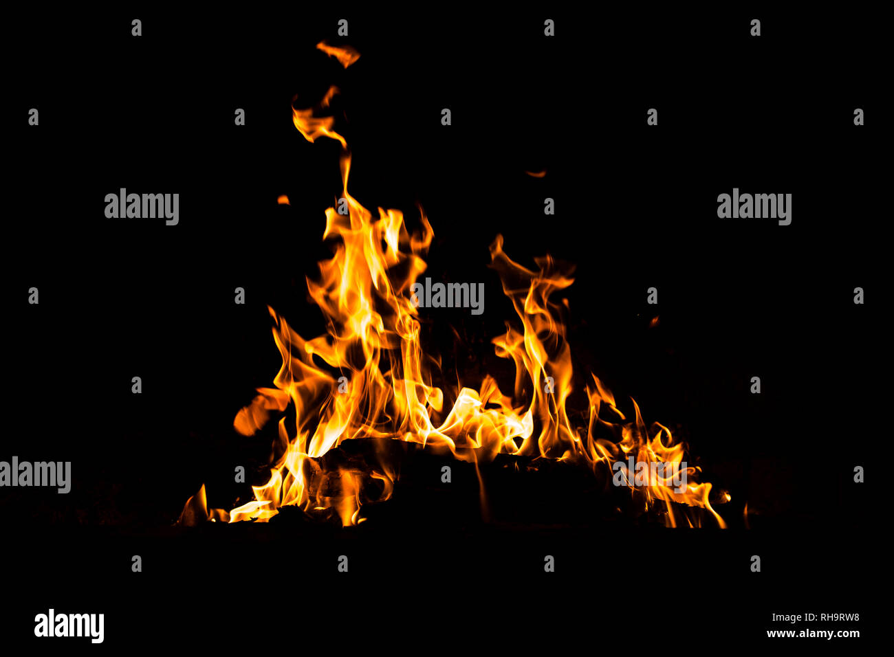 Fire flames burning isolated on black background. High resolution wood ...