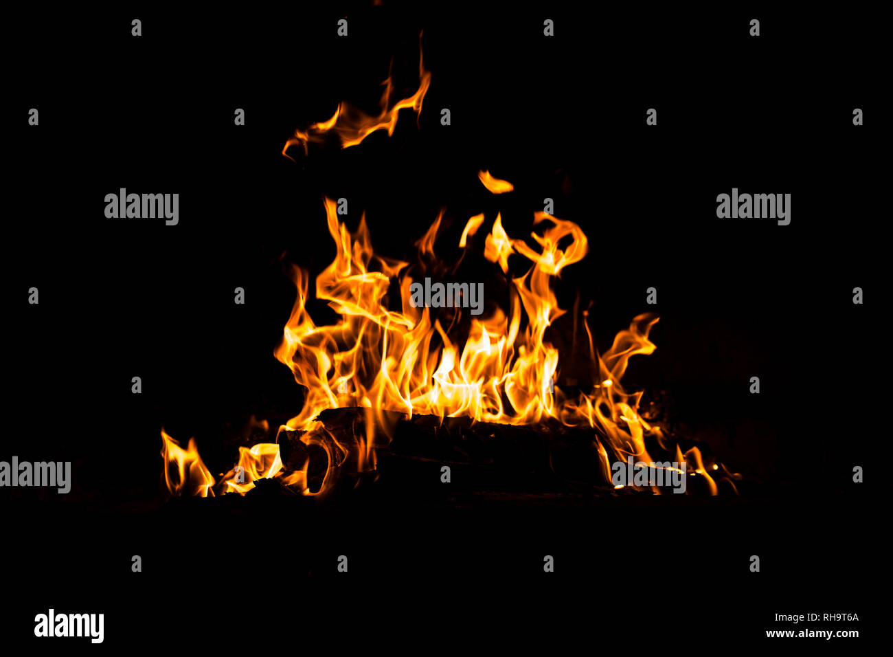 Fire flames burning isolated on black background. High resolution wood ...