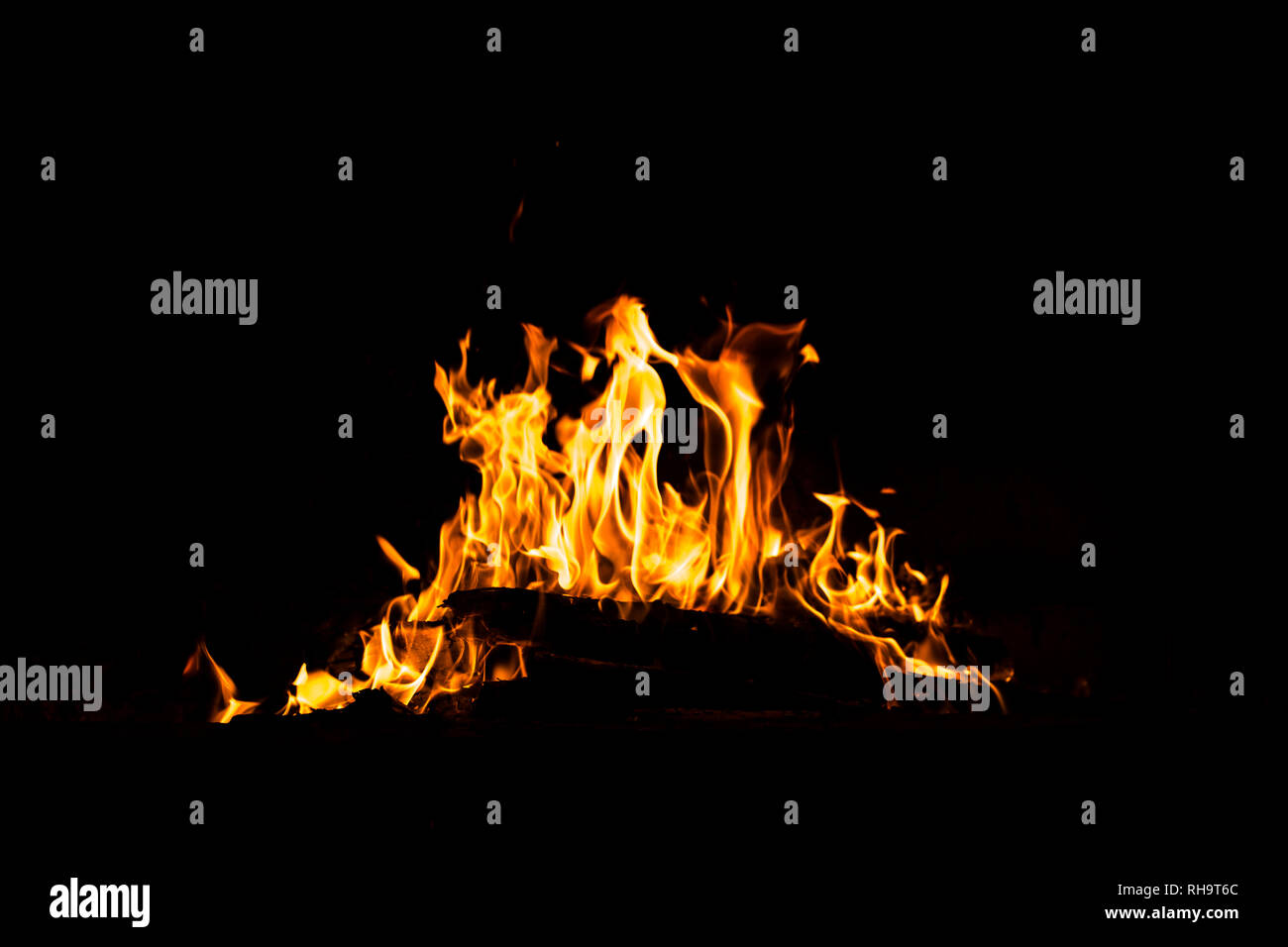 Fire flames burning isolated on black background. High resolution wood ...