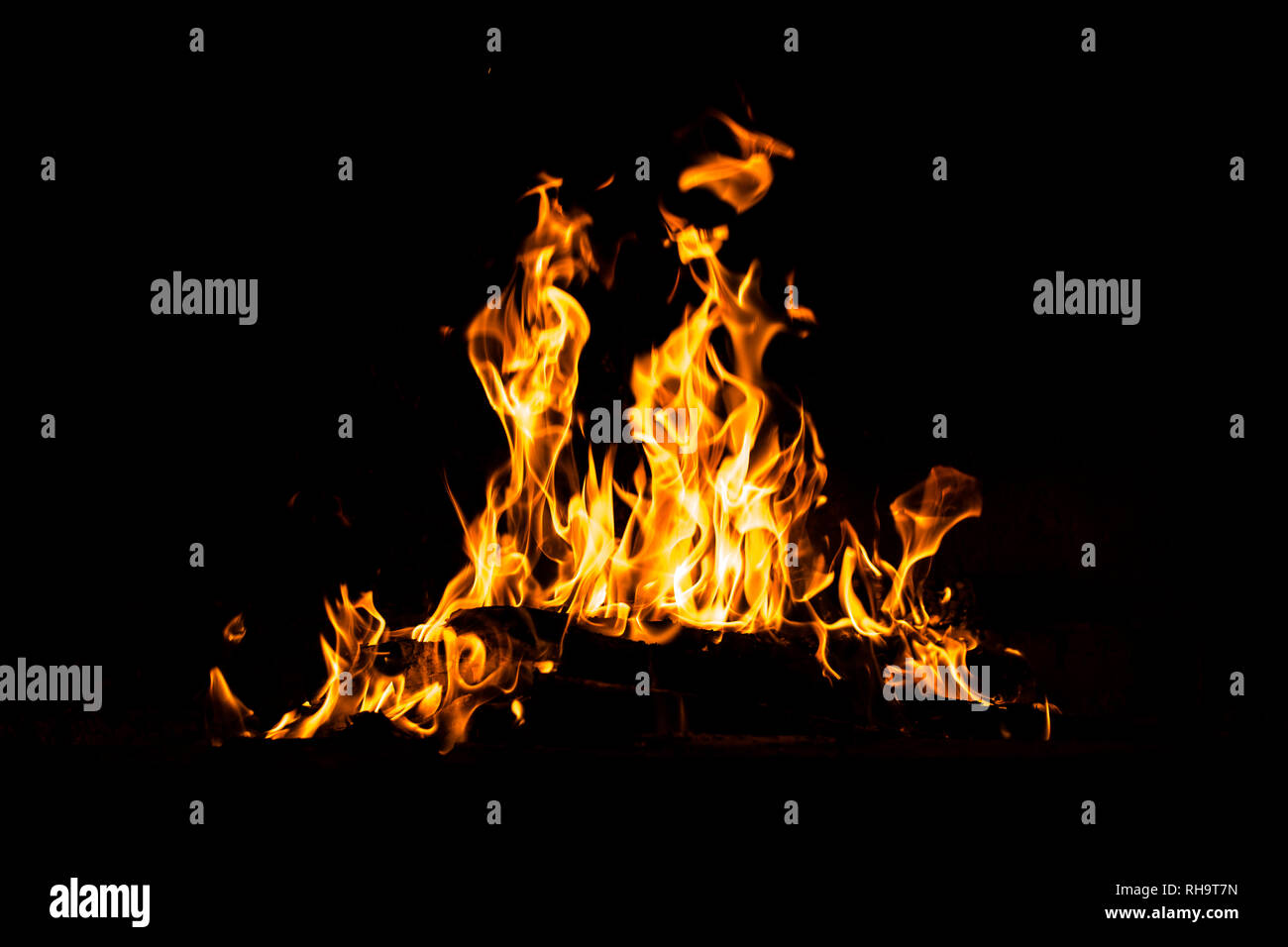 Fire flames burning isolated on black background. High resolution wood ...