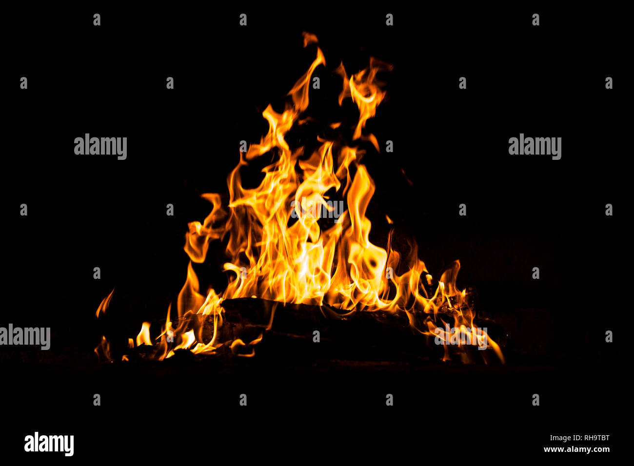 Fire flames burning isolated on black background. High resolution wood ...