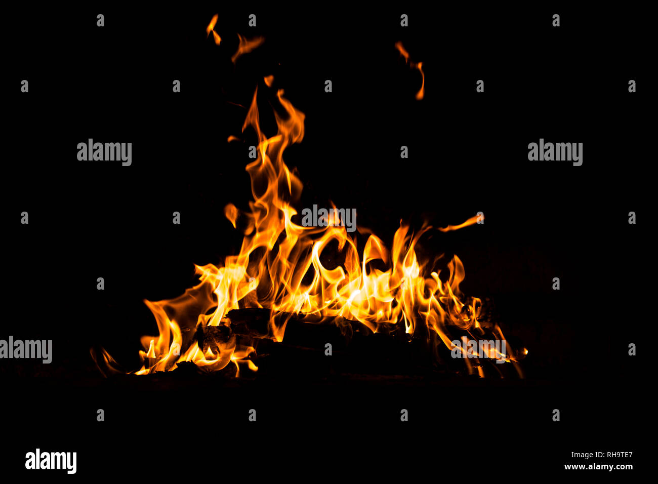 Fire flames burning isolated on black background. High resolution wood ...