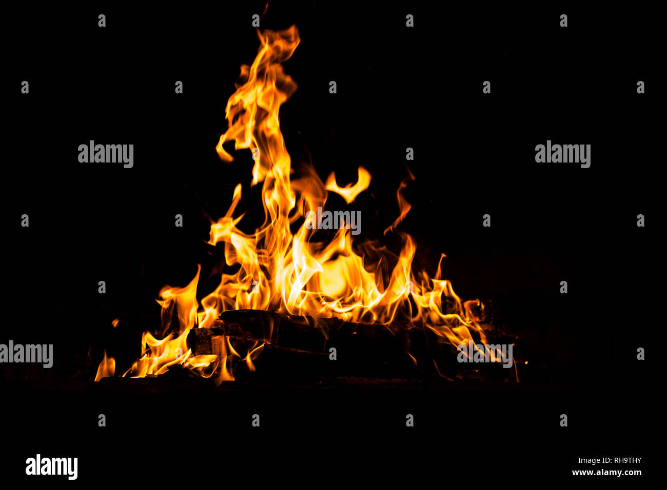Fire flames burning isolated on black background. High resolution wood ...