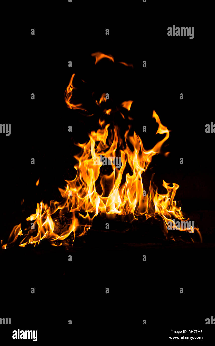 Fire flames burning isolated on black background. High resolution wood ...