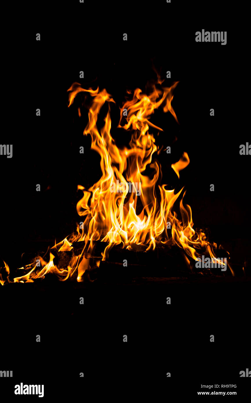 Fire flames burning isolated on black background. High resolution wood ...