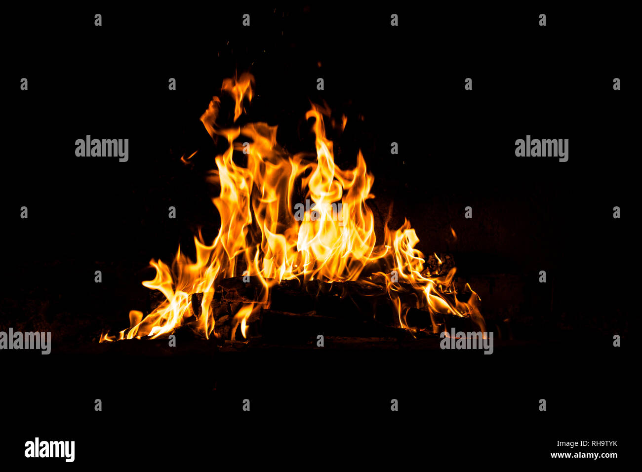 Fire flames burning isolated on black background. High resolution wood ...